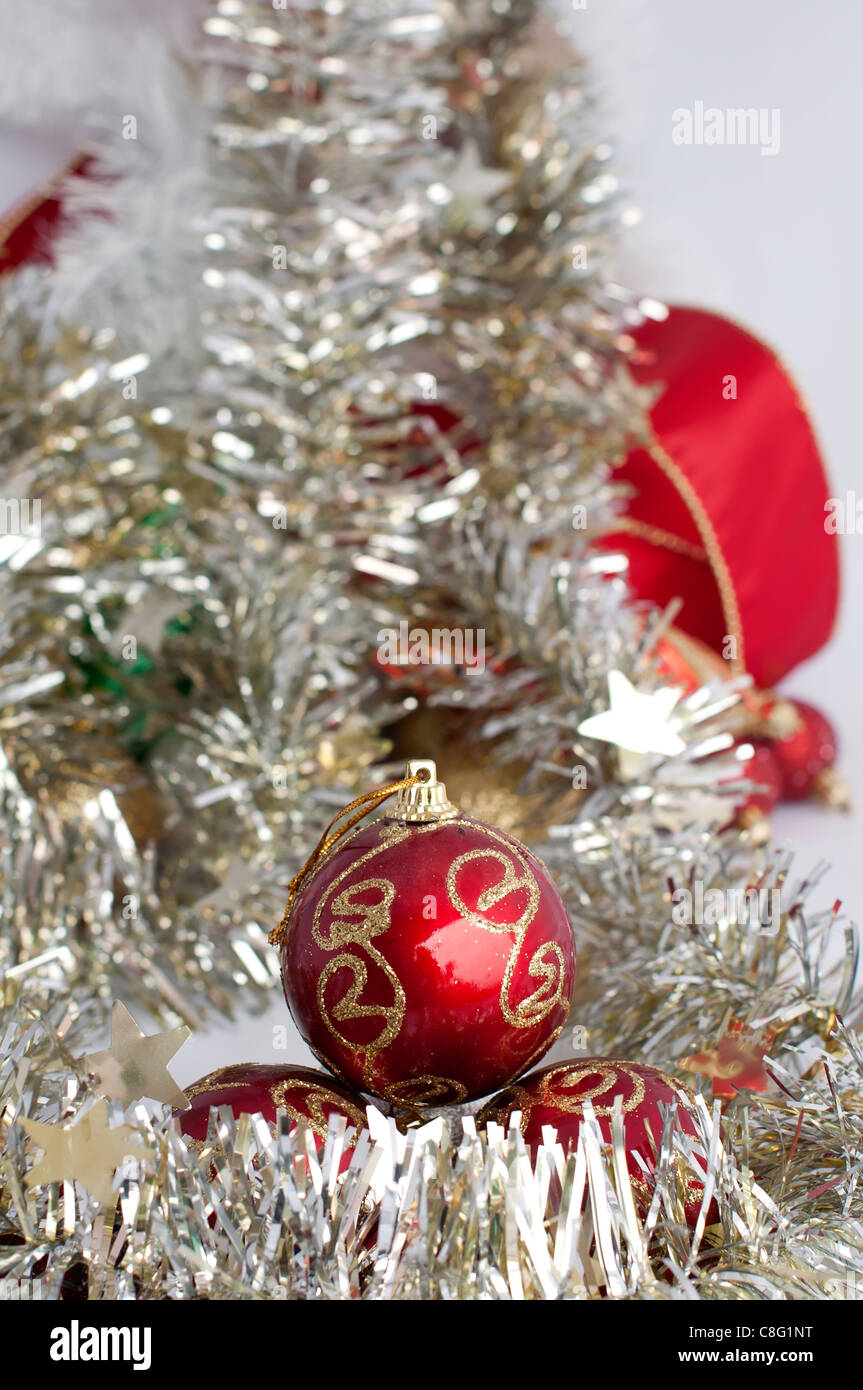Christmas motifs with balls and chains. Red and white balls, white ...