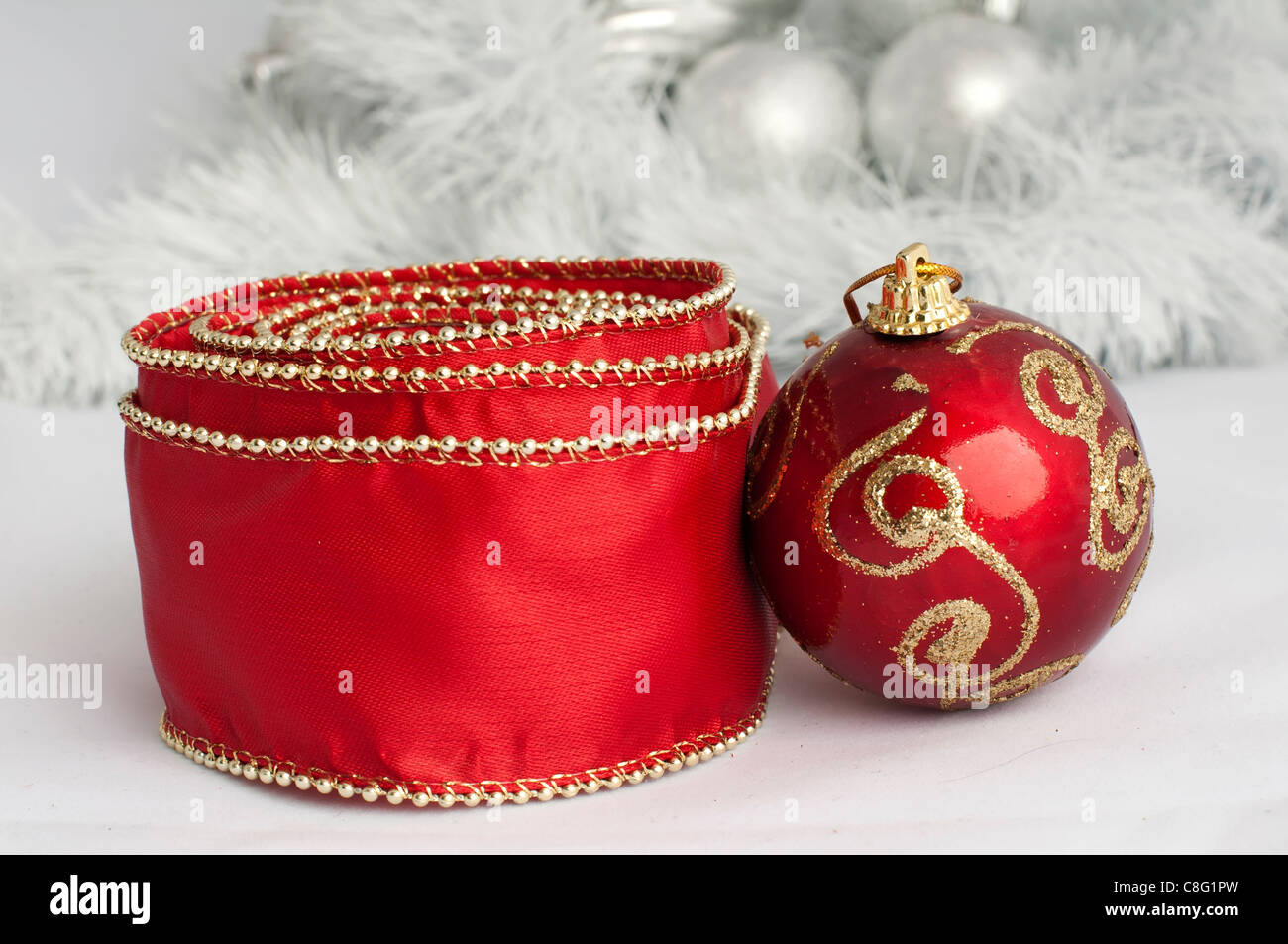 Christmas motifs with balls and chains. Red and white balls, white ...