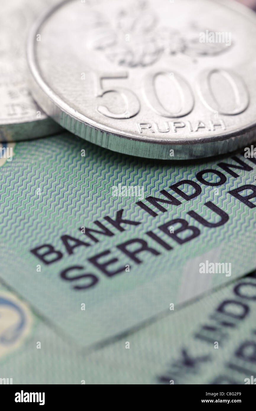 Indonesian rupiahs, coins and banknotes Stock Photo - Alamy