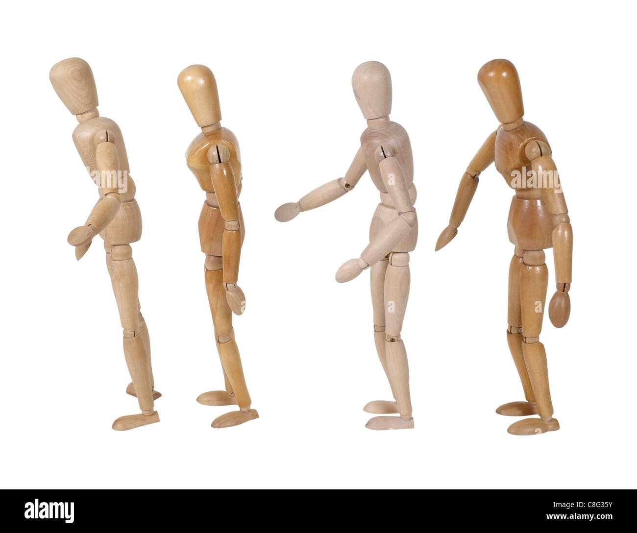 Wooden models representing people standing in line - path included ...