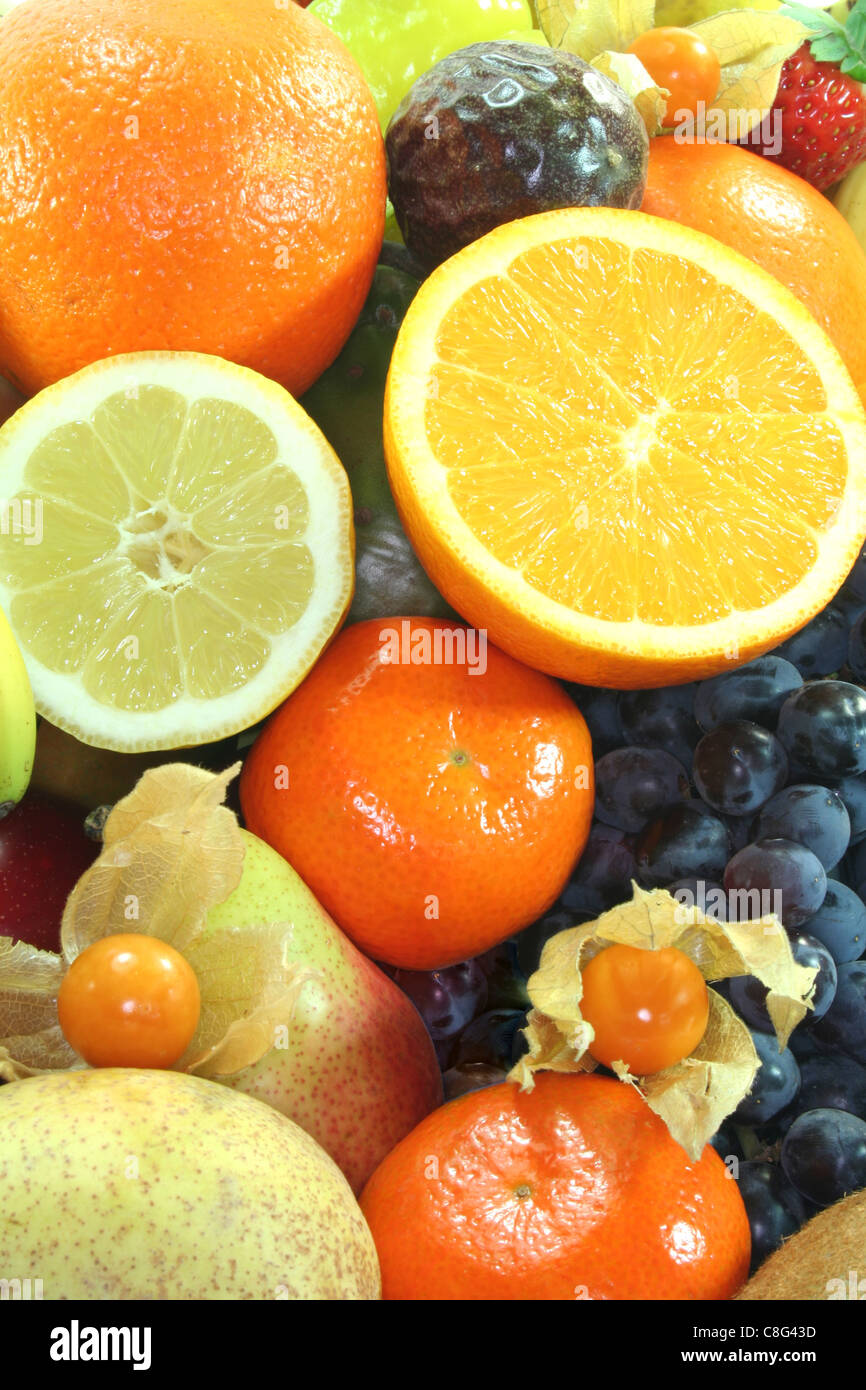 Mix of native and exotic fruits as a background Stock Photo - Alamy