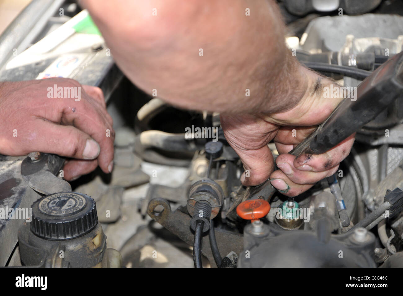 Man fixing engine of car hi-res stock photography and images - Alamy