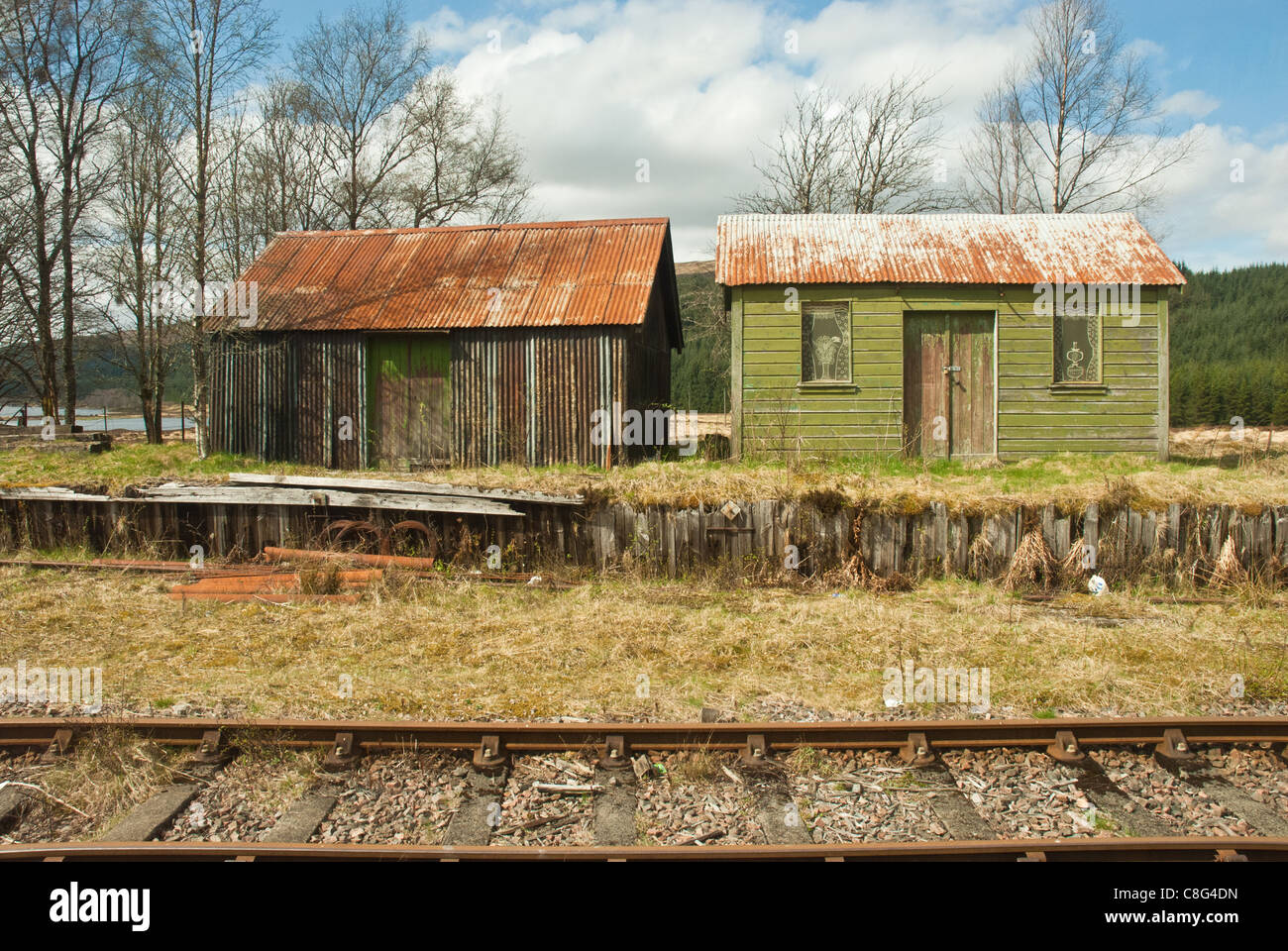 West Highland Railway. Rustic railway workers huts in sunshine with the ...