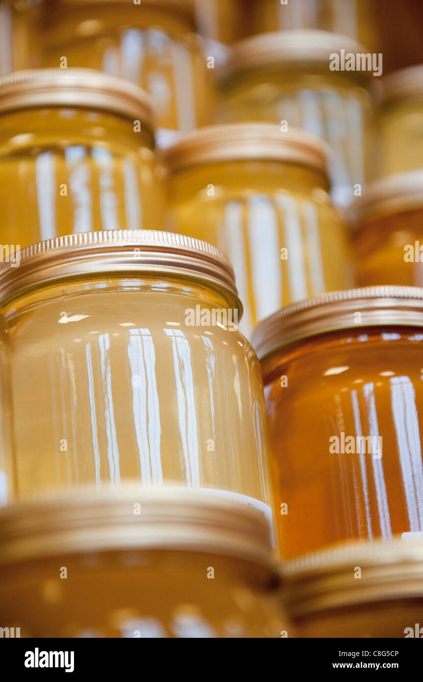 Jars of Honey on display at a honey show Stock Photo - Alamy