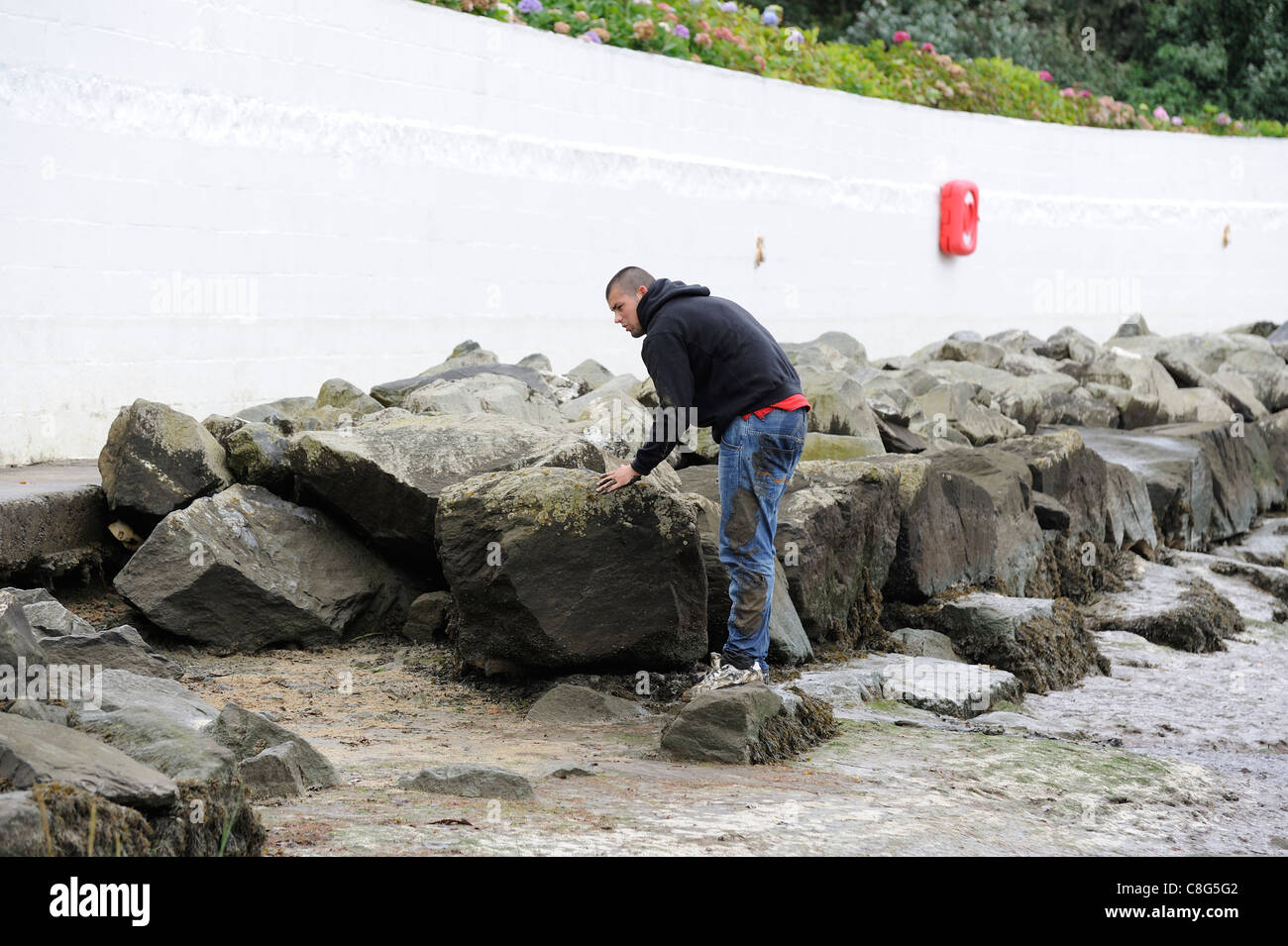 a man with mud on his trouser after falling over in the mud and ...