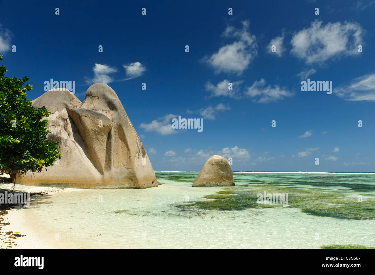 Boulder-strewn tropical beach, La Digue island, Seychelles, Africa ...