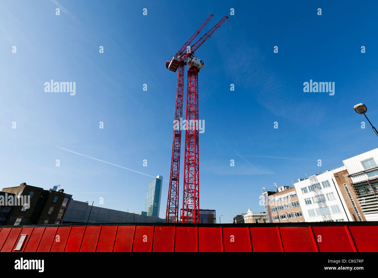 Cranes at a building site, Cygnet Street, Hackney, London, England, UK ...