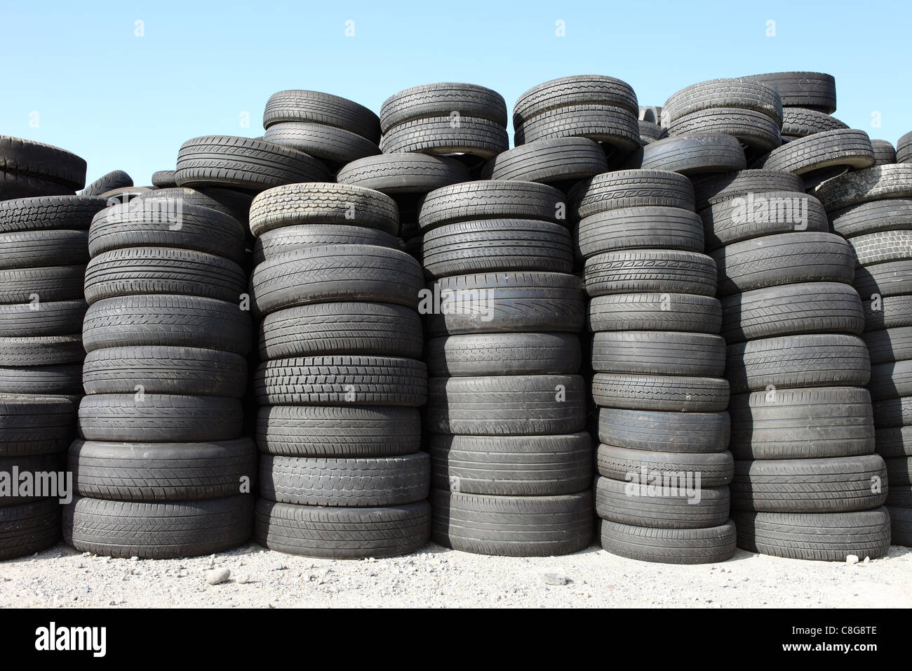 Pile of stacked old tires for rubber recycling Stock Photo - Alamy