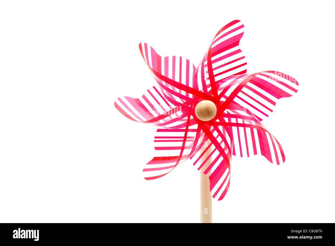 Colorful toy pinwheel windmill on white background Stock Photo - Alamy