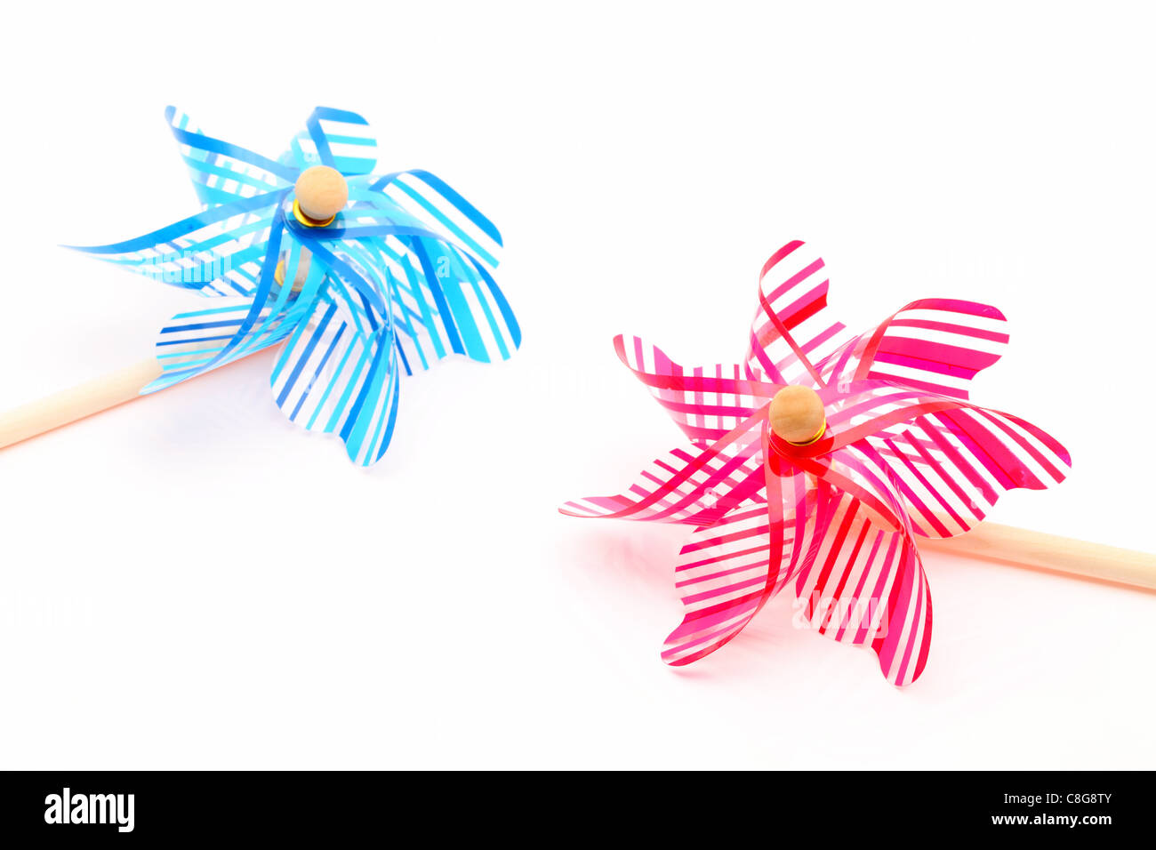 Colorful toy pinwheel windmill on white background Stock Photo - Alamy