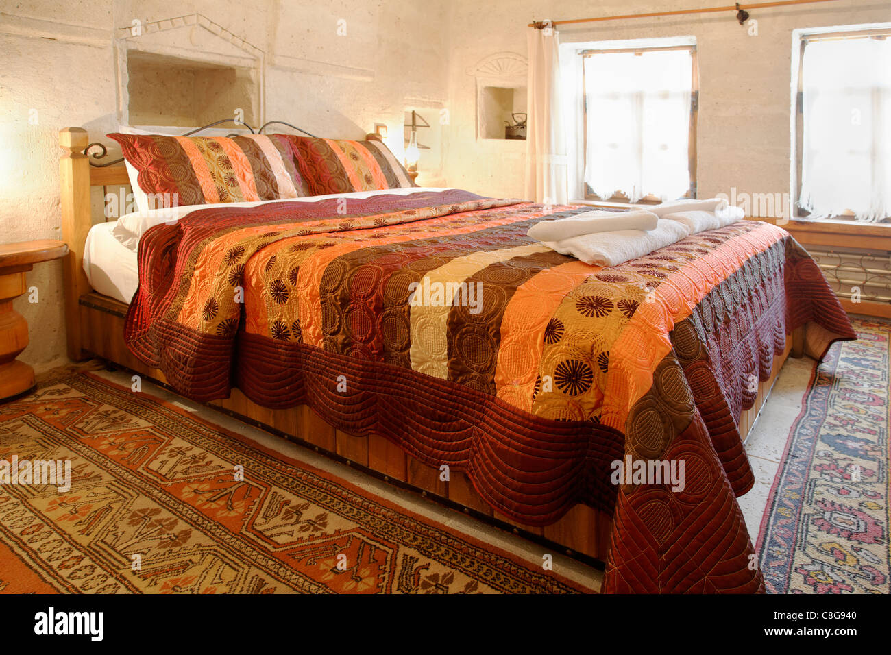 renovated bedroom of limestone cave bright airy colorful interior ...