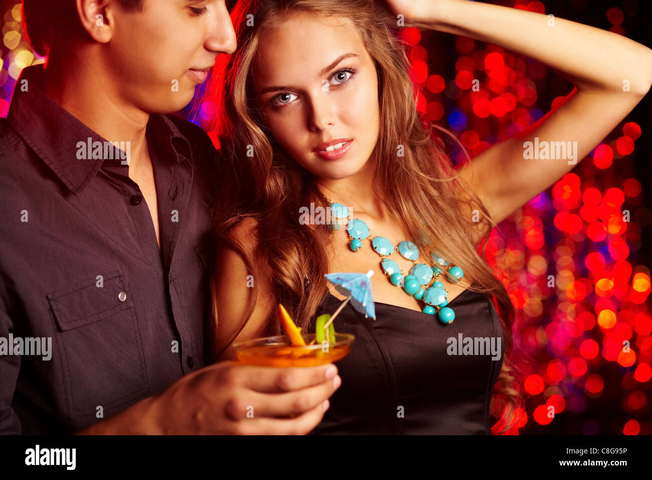 Young beautiful couple dancing at party Stock Photo - Alamy