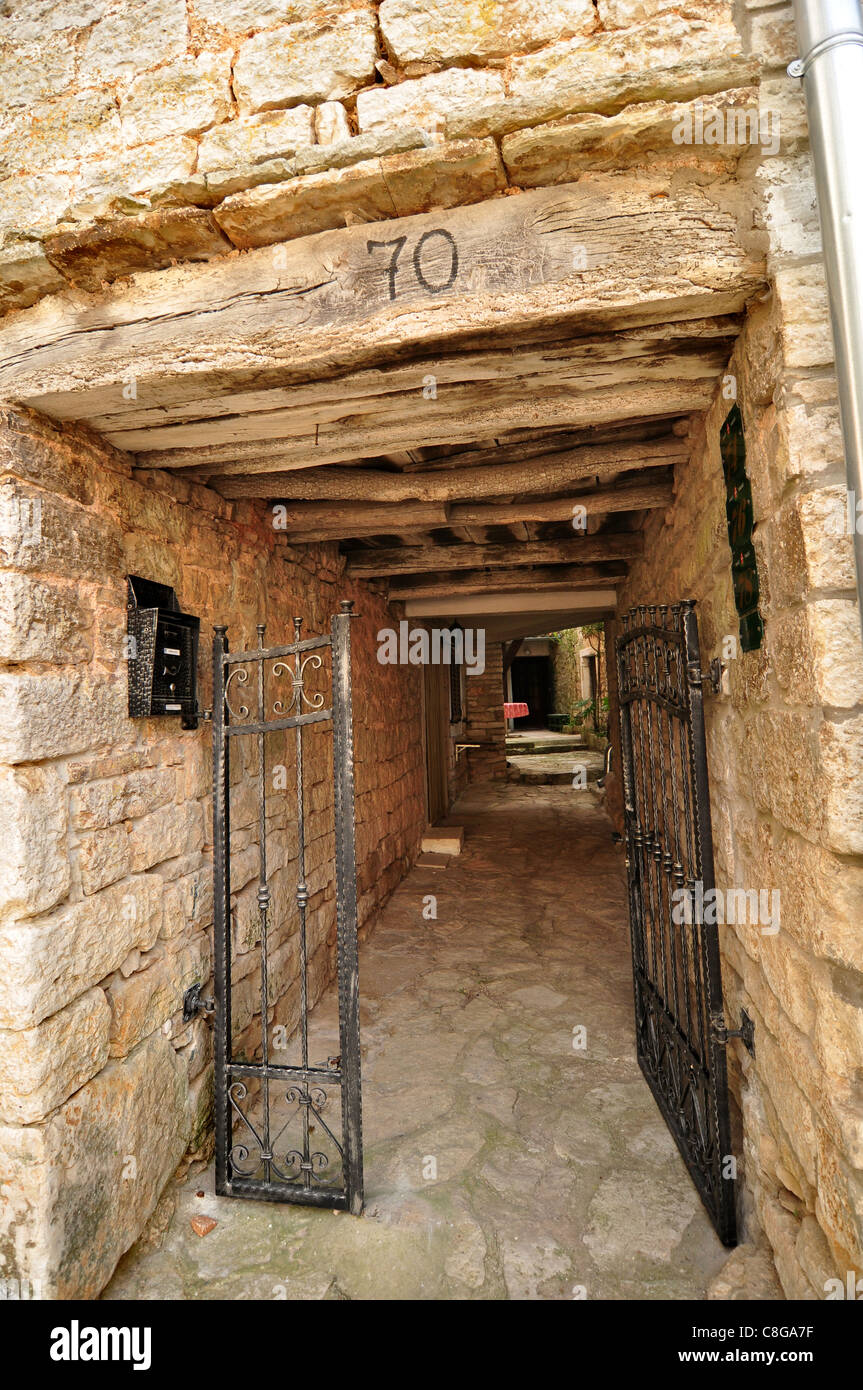 Entrance into old medieval house Stock Photo - Alamy