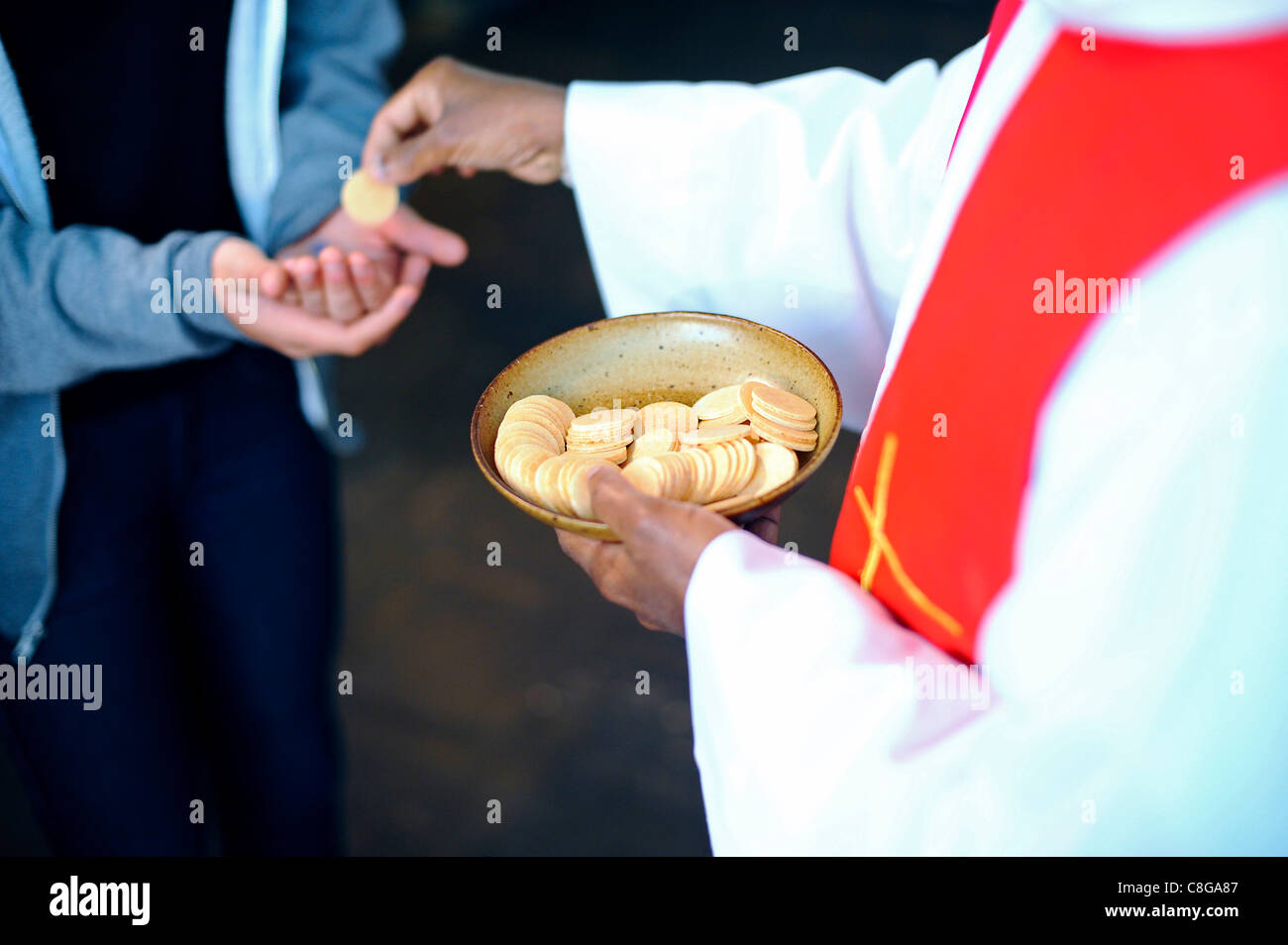 People receiving communion hi-res stock photography and images - Alamy
