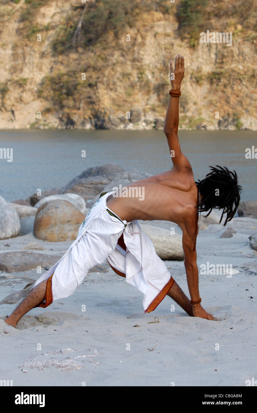 Indian man beach yoga hi-res stock photography and images - Alamy