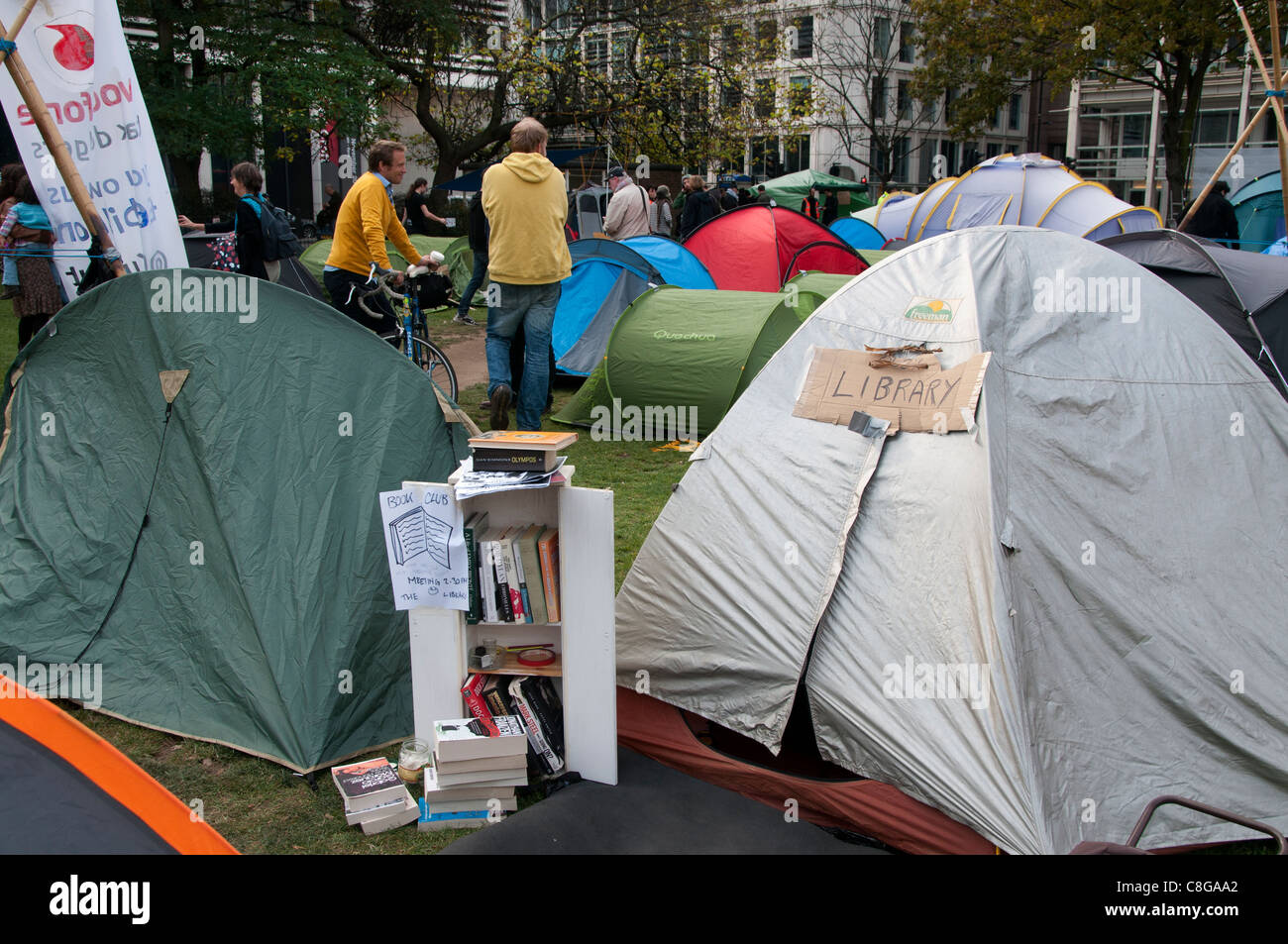 Occupy London. Finsbury Square.The library tent with bookshelf Stock ...