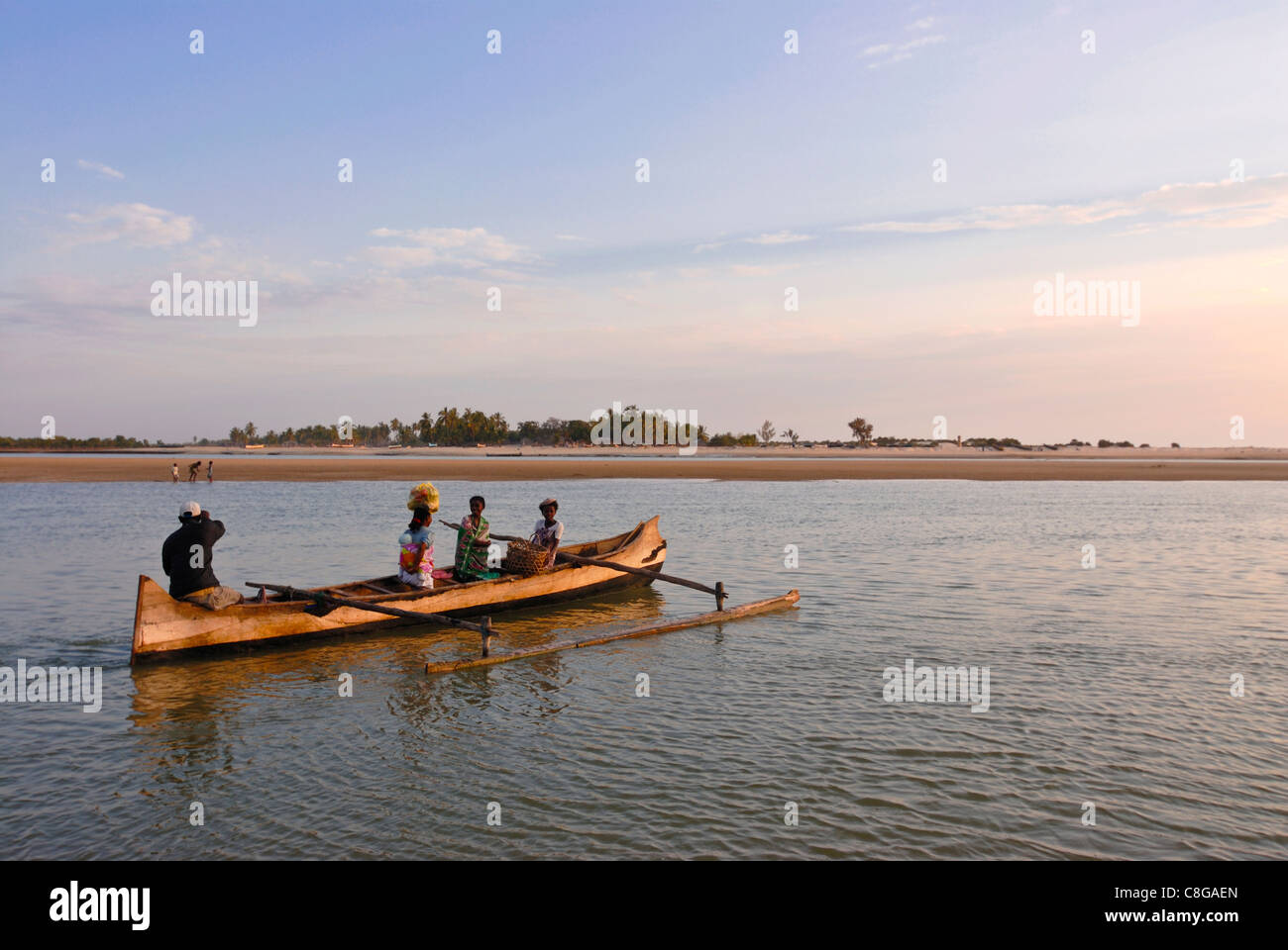 Little canoe crossing a chanel at Morondava, Madagascar, Indian Ocean ...