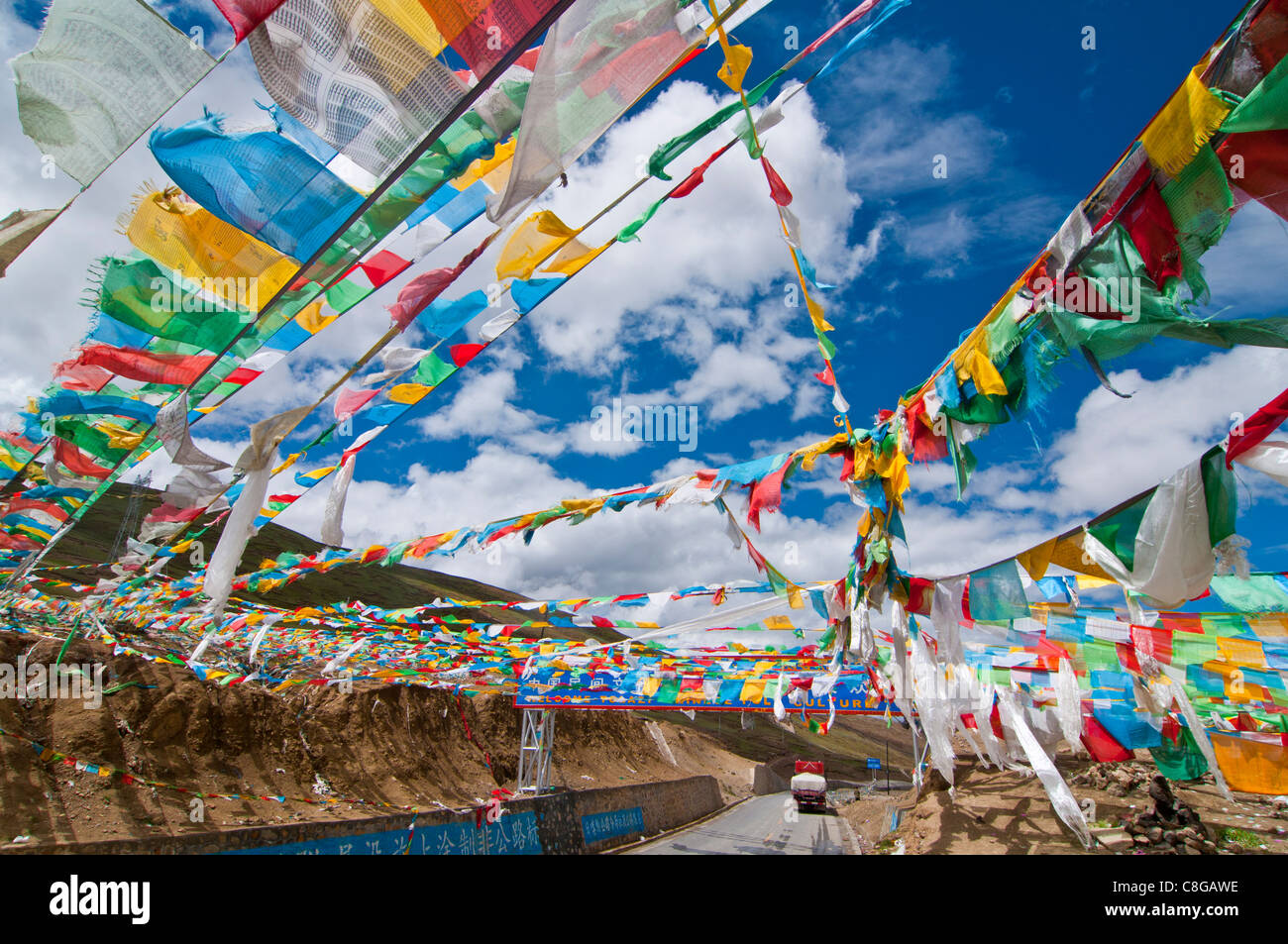 Prayer flags crossing the Friendship Highway between Lhasa and ...