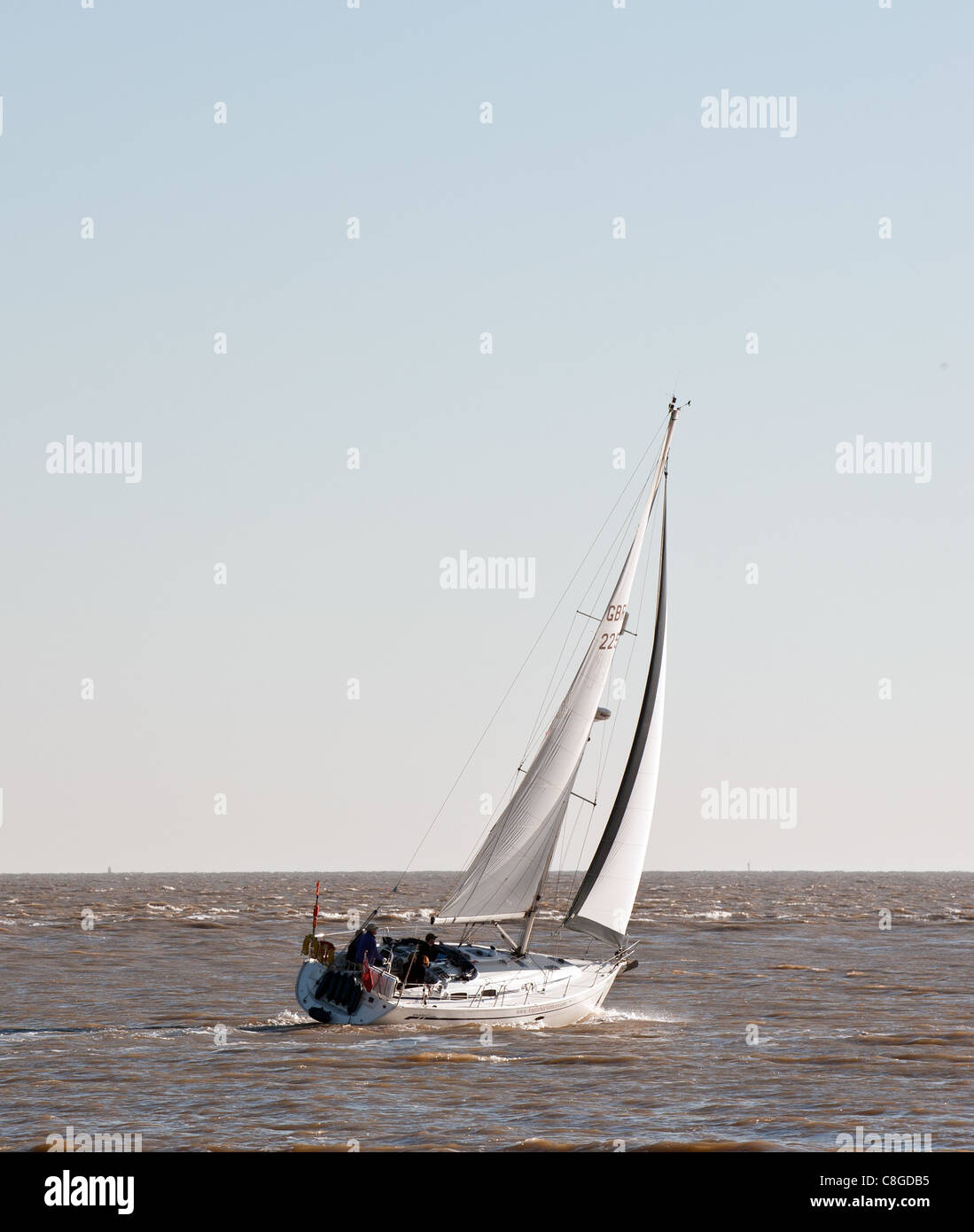 A yacht sailing out to sea Stock Photo - Alamy