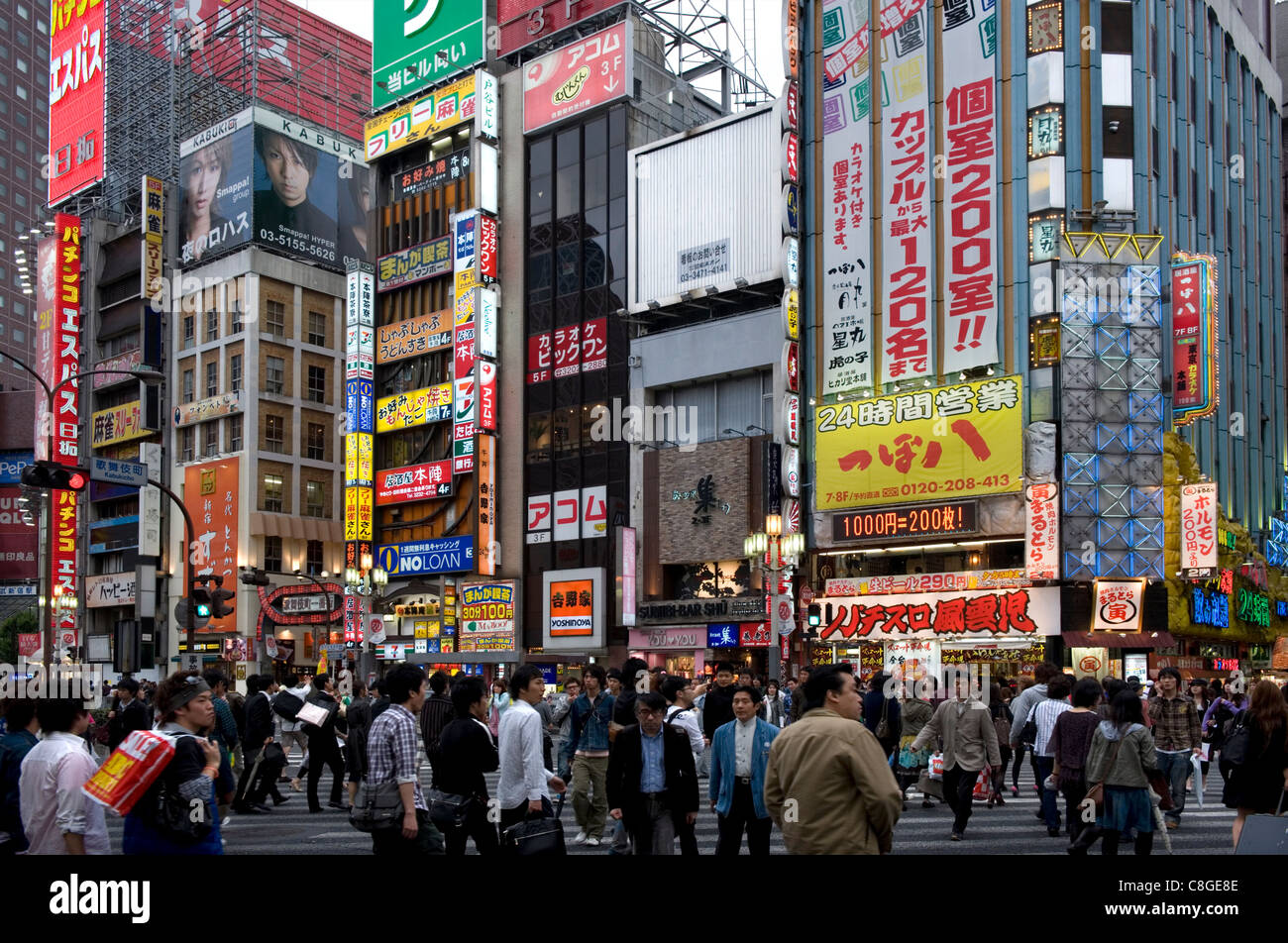 Neon signs light up the Kabukicho entertainment district in Shinjuku ...