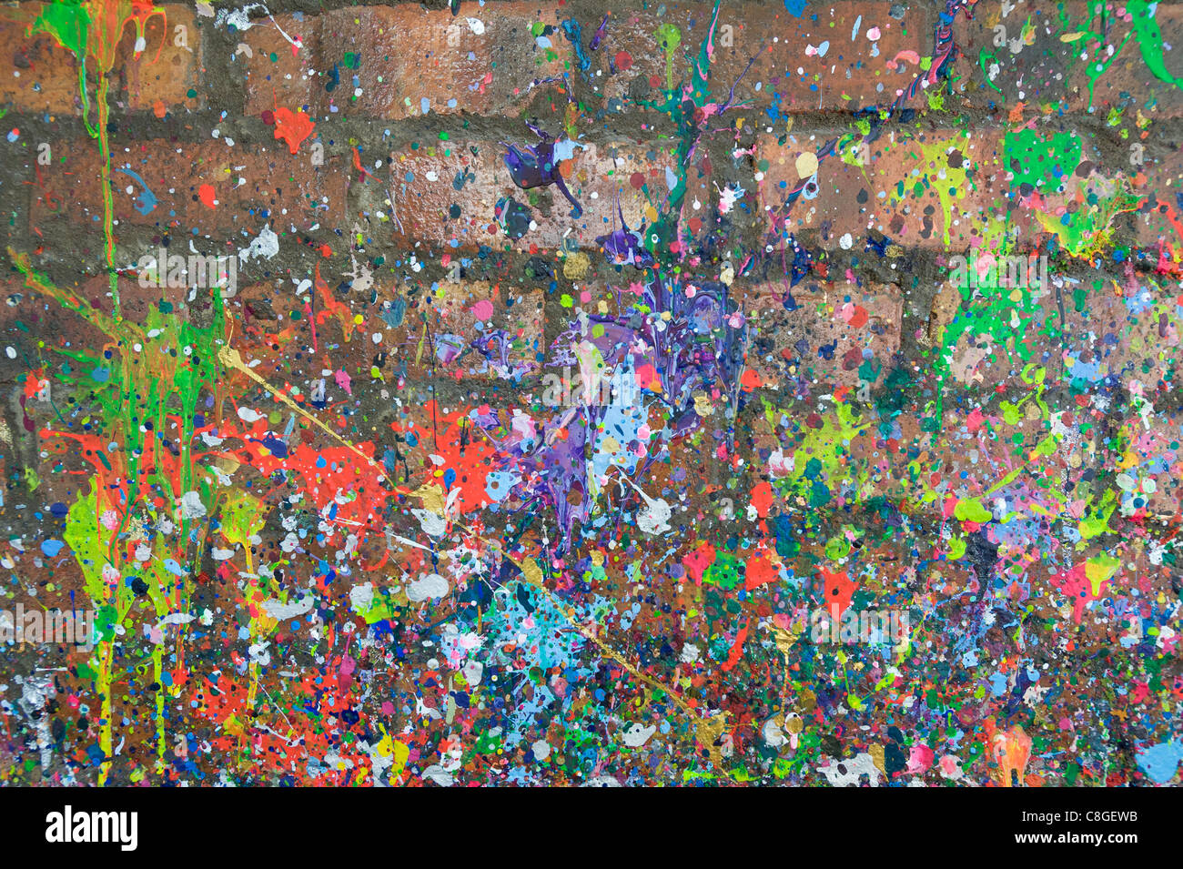 Paint splotches on a brick wall Cape Town South Africa Stock Photo - Alamy