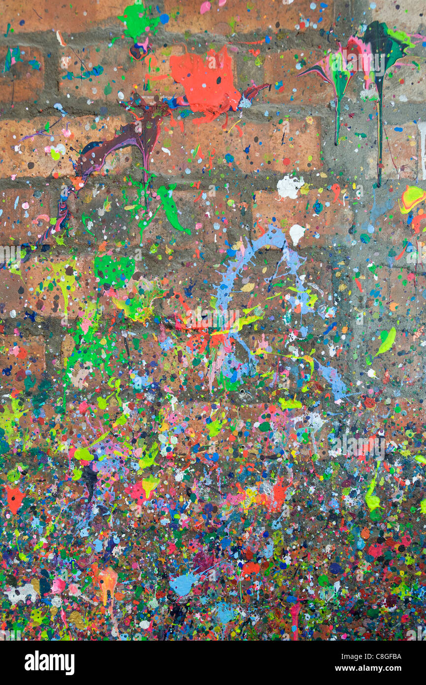 Paint splotches on a brick wall Cape Town South Africa Stock Photo - Alamy