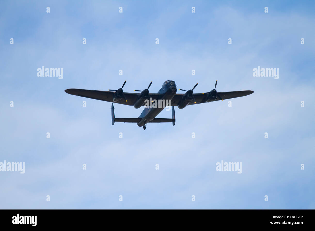 a restored WW2 lancaster bomber flying low Stock Photo - Alamy