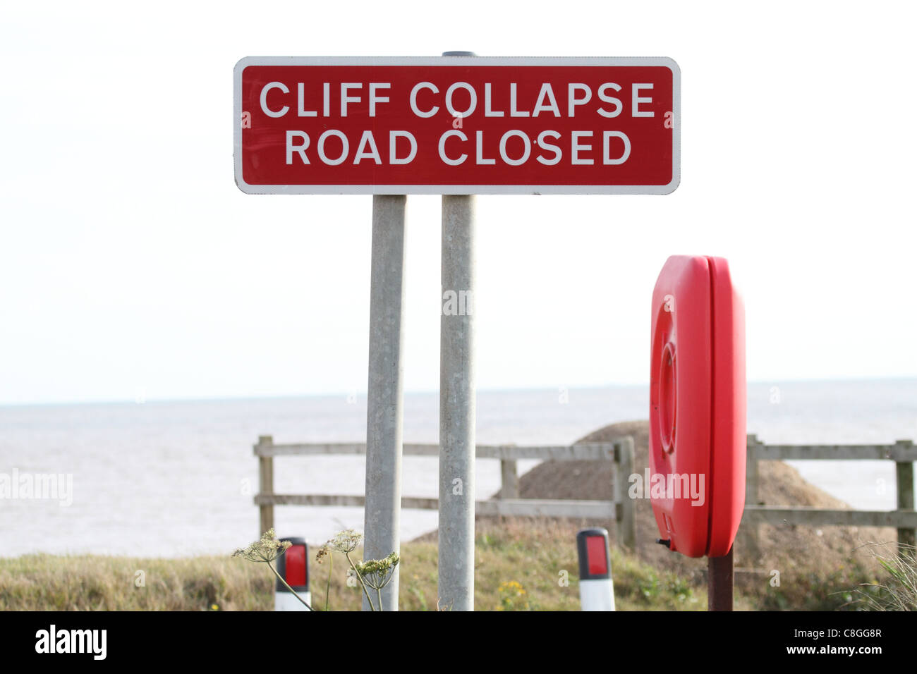 rectangular red warning sign white letters cliff collapse road closed ...