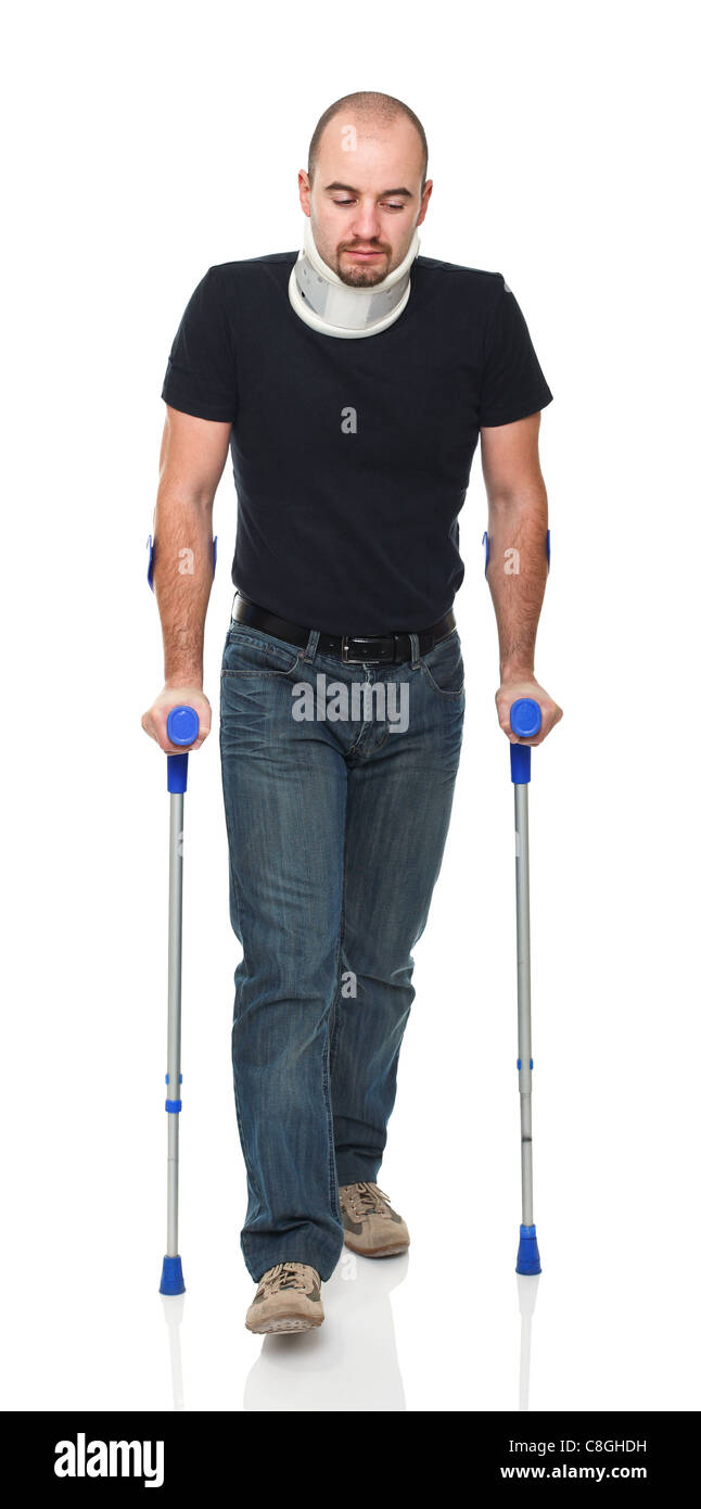 young man with crutch isolated on white Stock Photo - Alamy