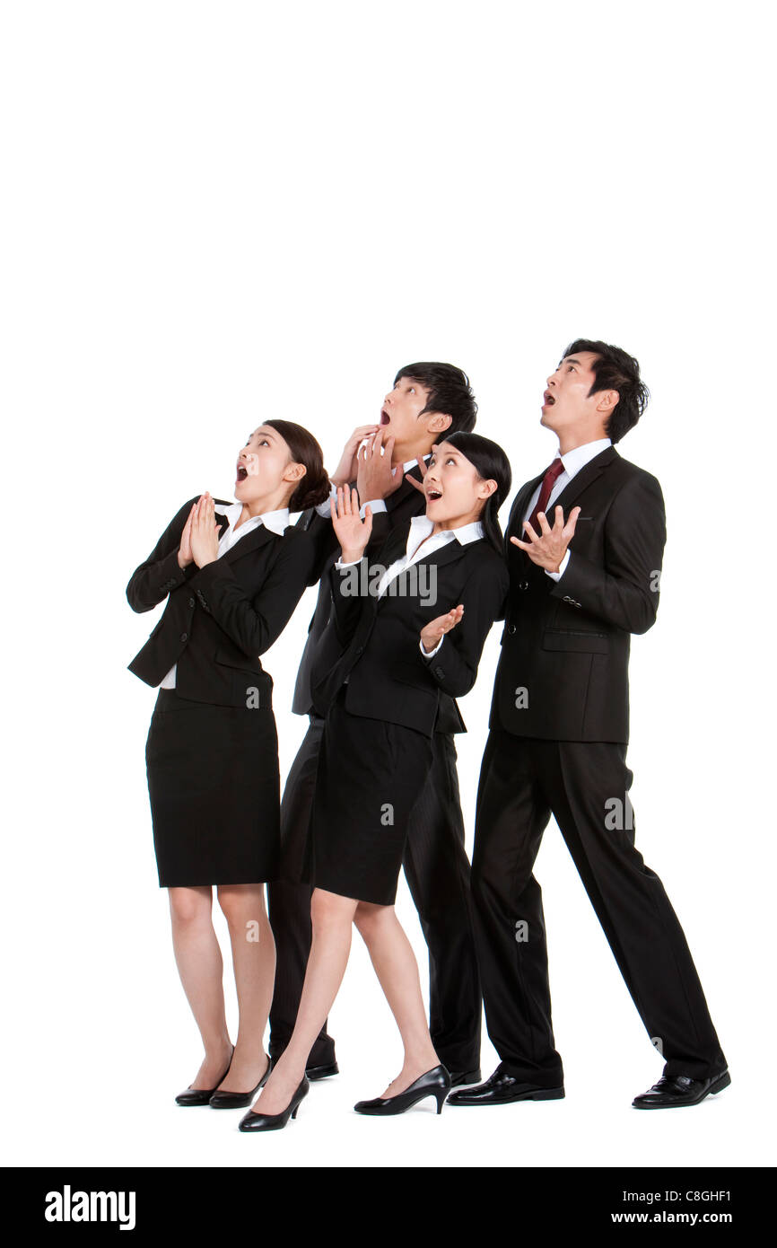 Surprised business team Stock Photo - Alamy
