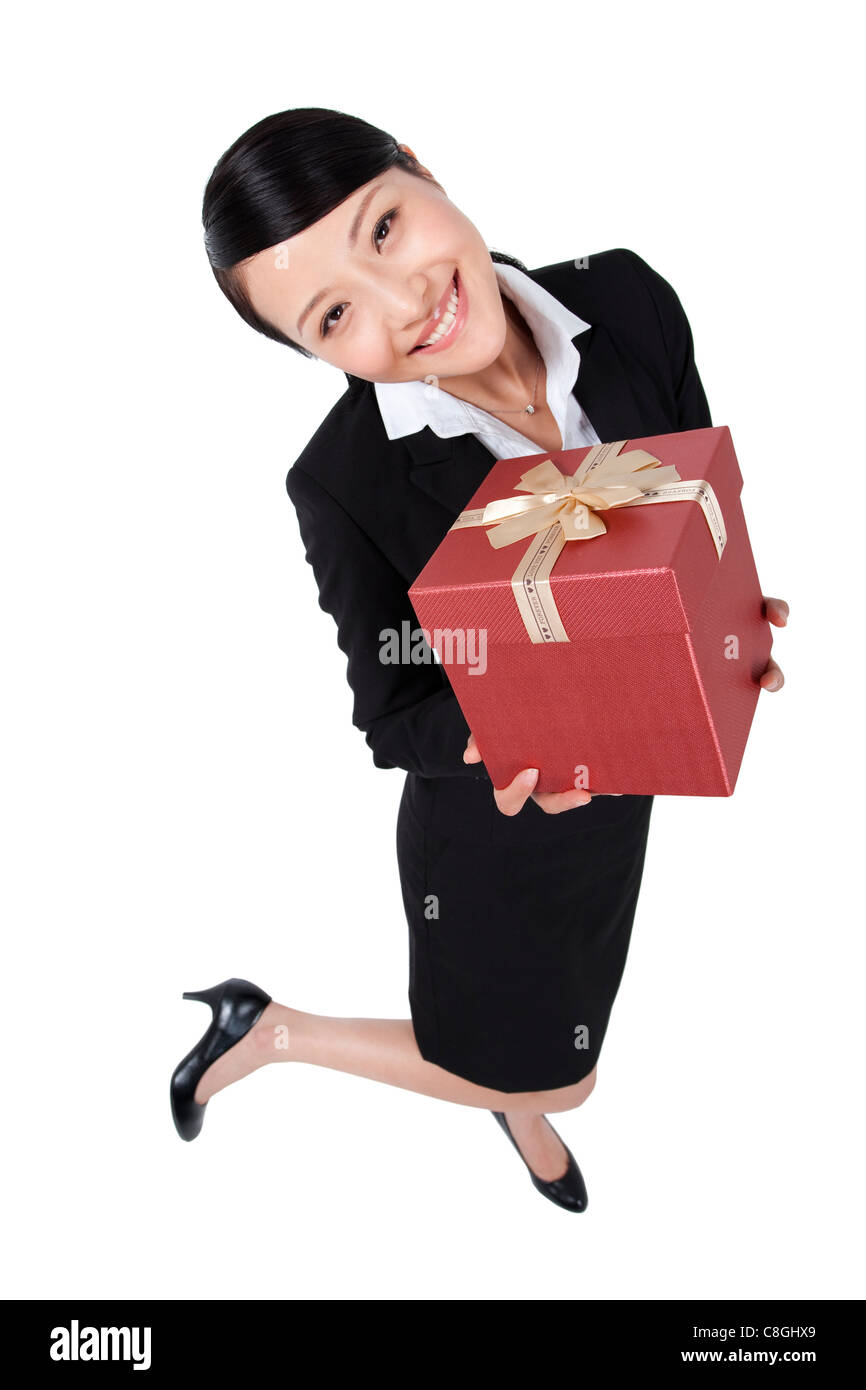Woman Carrying A Box On Her Head High Resolution Stock Photography and ...