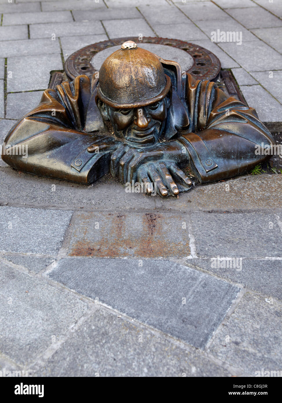 Cumil statue, Bratislava, Slovakia Stock Photo - Alamy