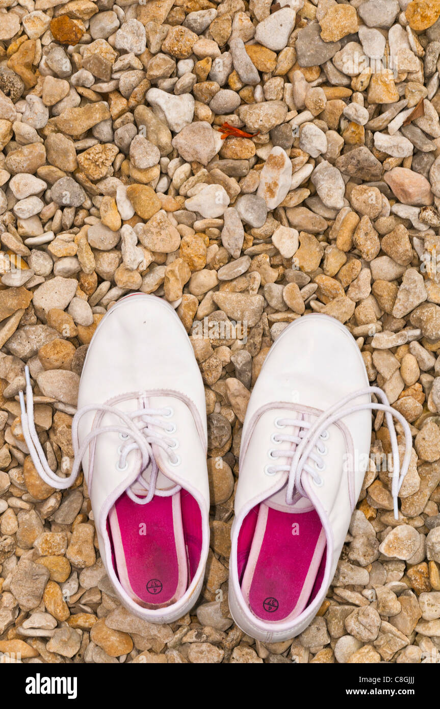 White summer shoes on stones Stock Photo - Alamy