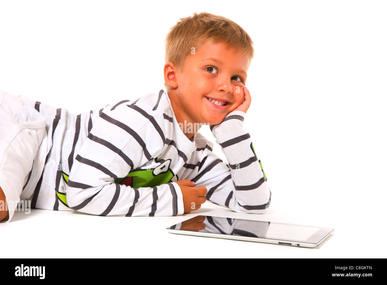 little boy using digital tablet Stock Photo - Alamy