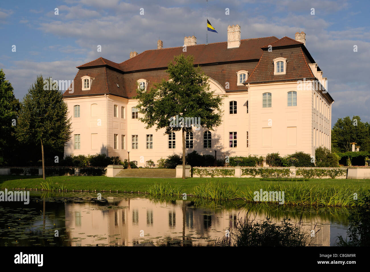 Schloss Branitz Castle with a lake in Fuerst Pueckler Park Branitz ...