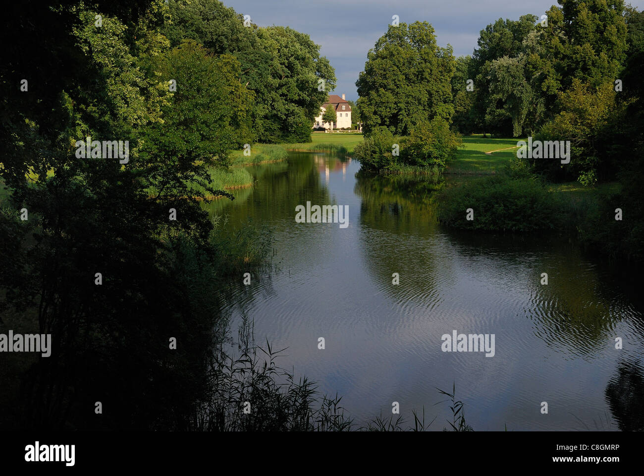Schloss Branitz Castle with a lake in Fuerst Pueckler Park Branitz ...