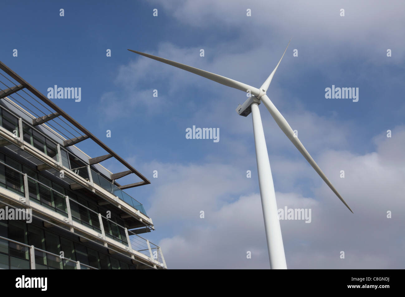 Wind turbine against blue sky, exterior, onshore, with Orbis Energy ...