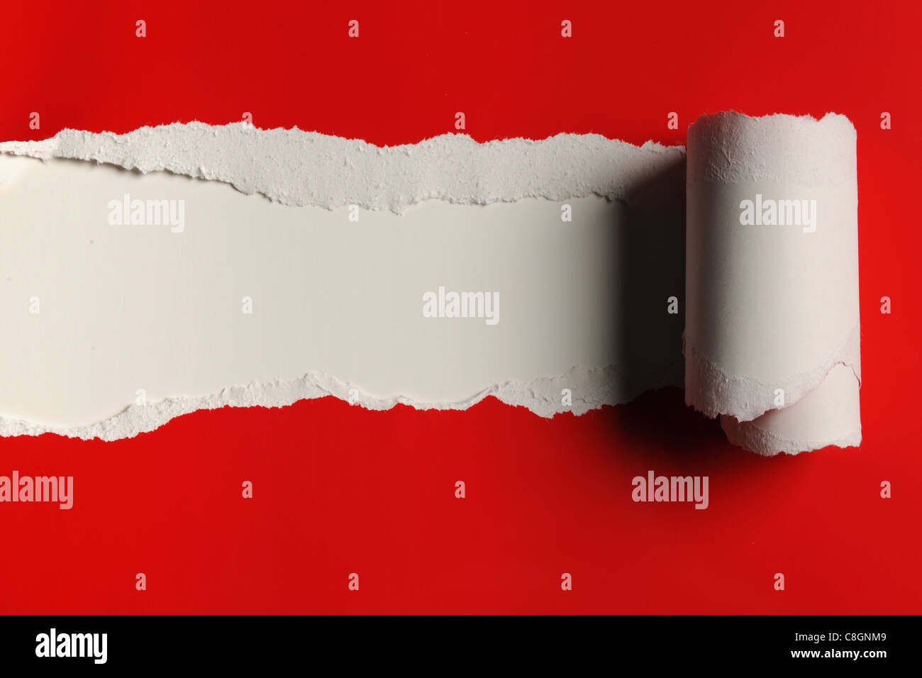 Rip red Paper and white background with space for text Stock Photo - Alamy