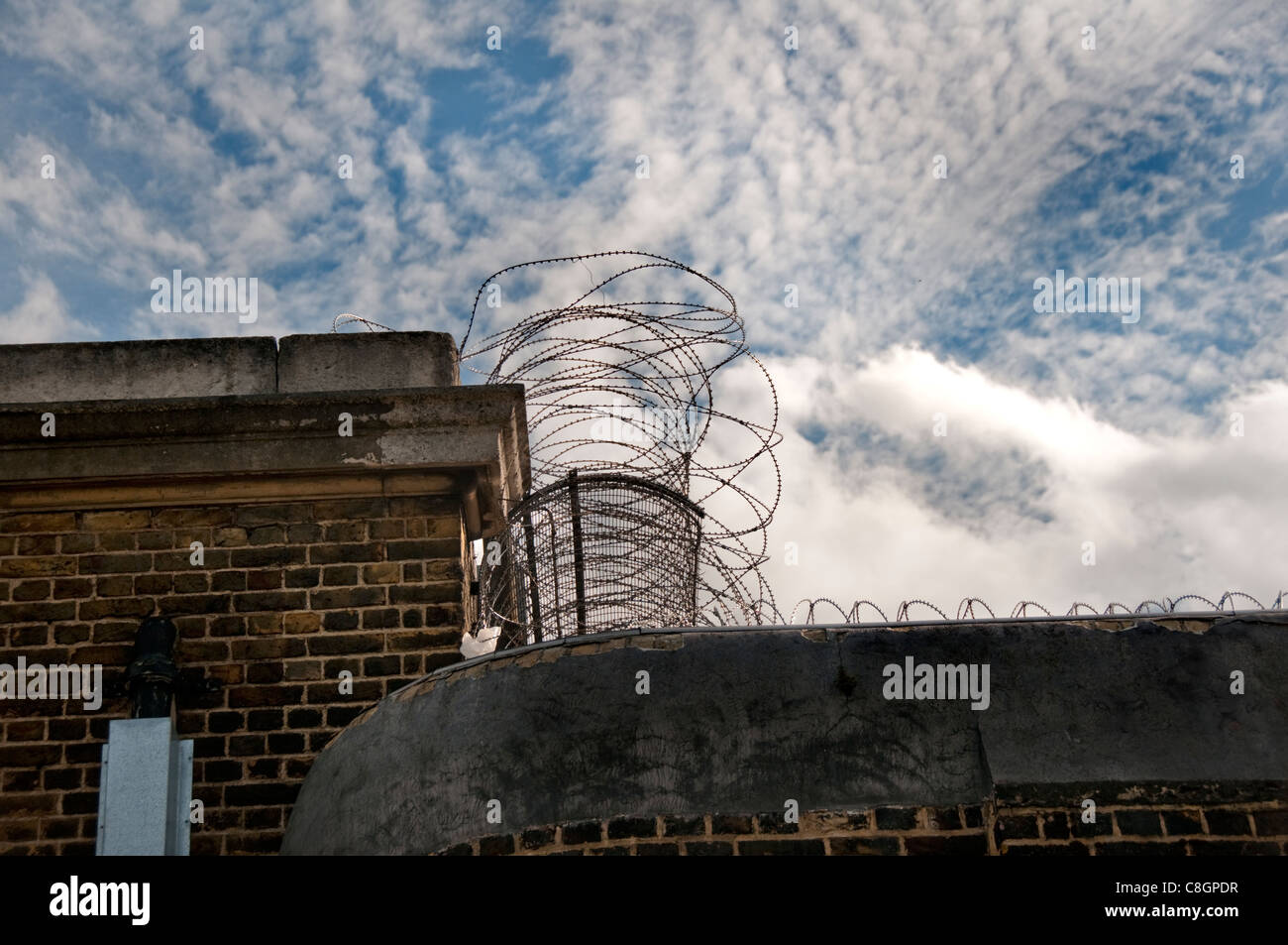 Razor wire on walls of Brixton Prison South London Brixton prison in ...