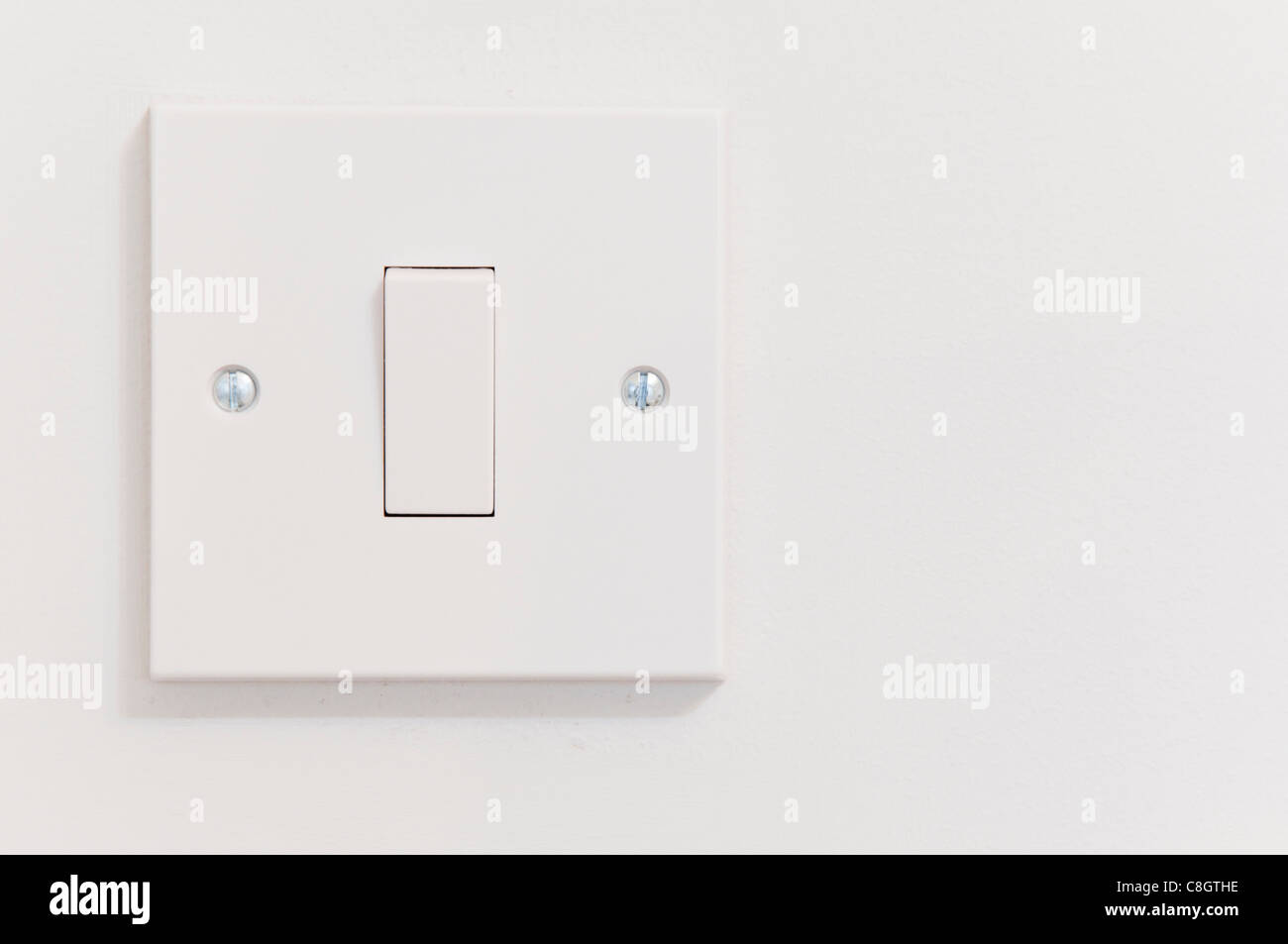 White domestic light switch Stock Photo - Alamy