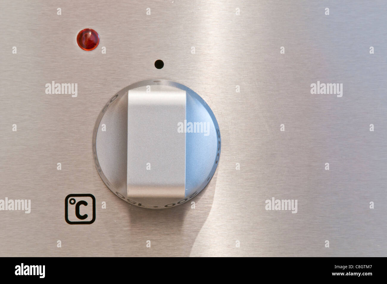 Cooker control knob in stainless steel Stock Photo - Alamy