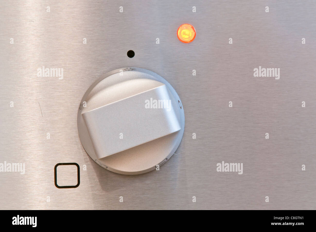 Cooker control knob in stainless steel Stock Photo - Alamy