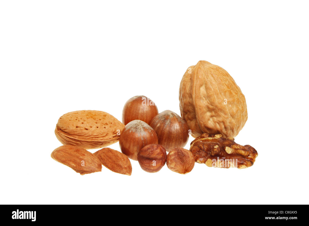 Group of whole and shelled nuts isolated against white Stock Photo - Alamy