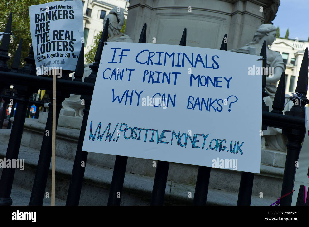 Placards with slogans and banners at the anti Capitalist protest St ...