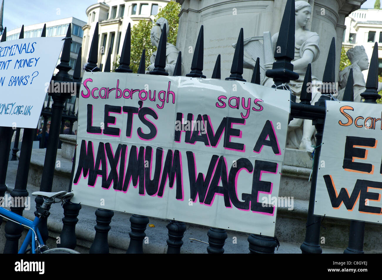 Placards with slogans and banners at the anti Capitalist protest St ...