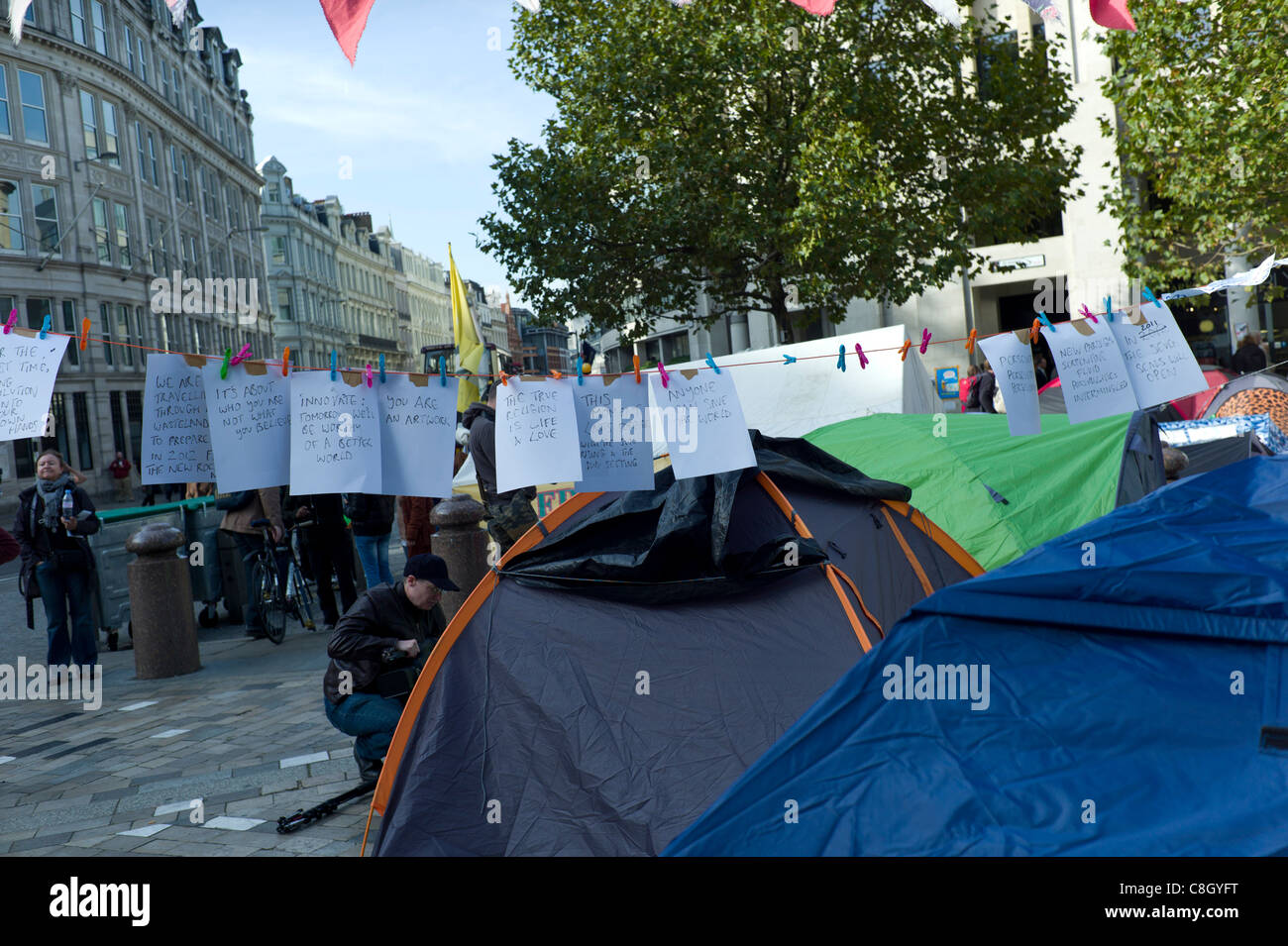 Tents with slogans and banners at the anti Capitalist protest St.Paul's ...