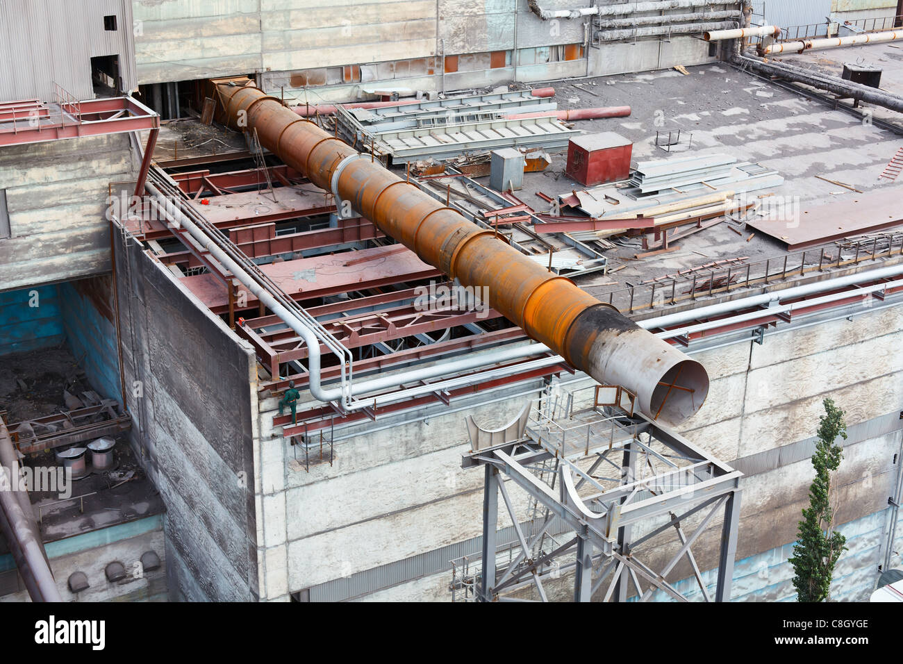 Above-ground gas, oil and heat pipes rack in factory area. Aerial view ...