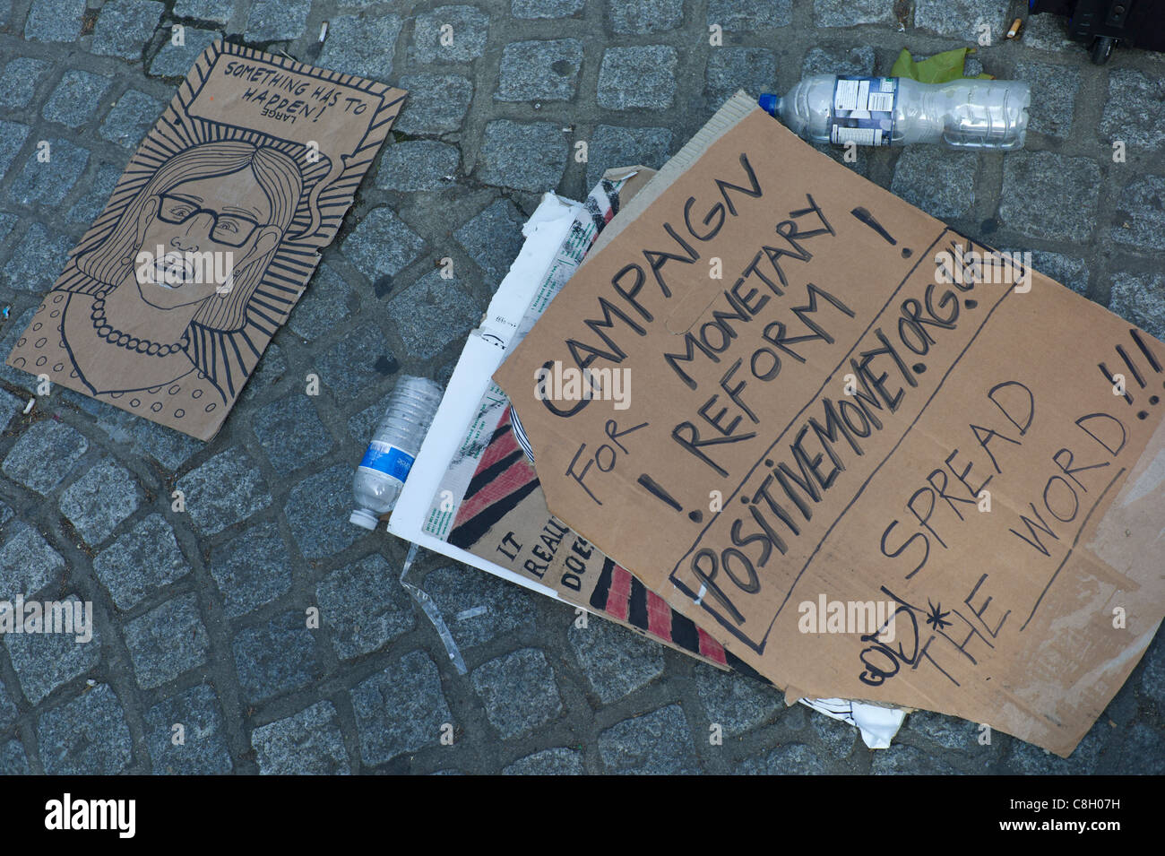 Placards with slogans and banners at the anti Capitalist protest St ...
