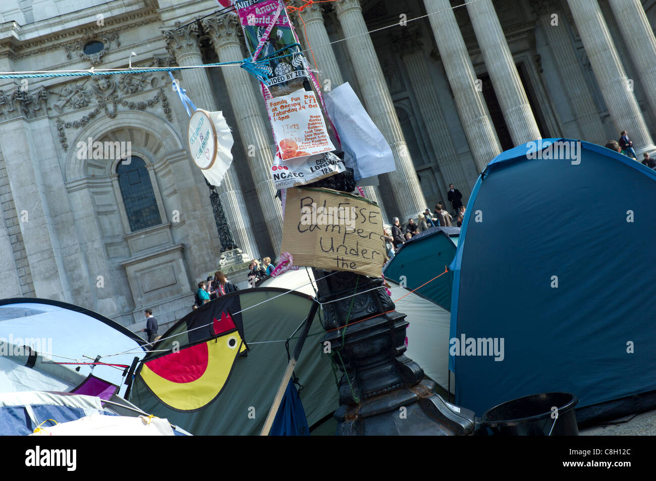 Tents with slogans and banners at the anti Capitalist protest St.Paul's ...