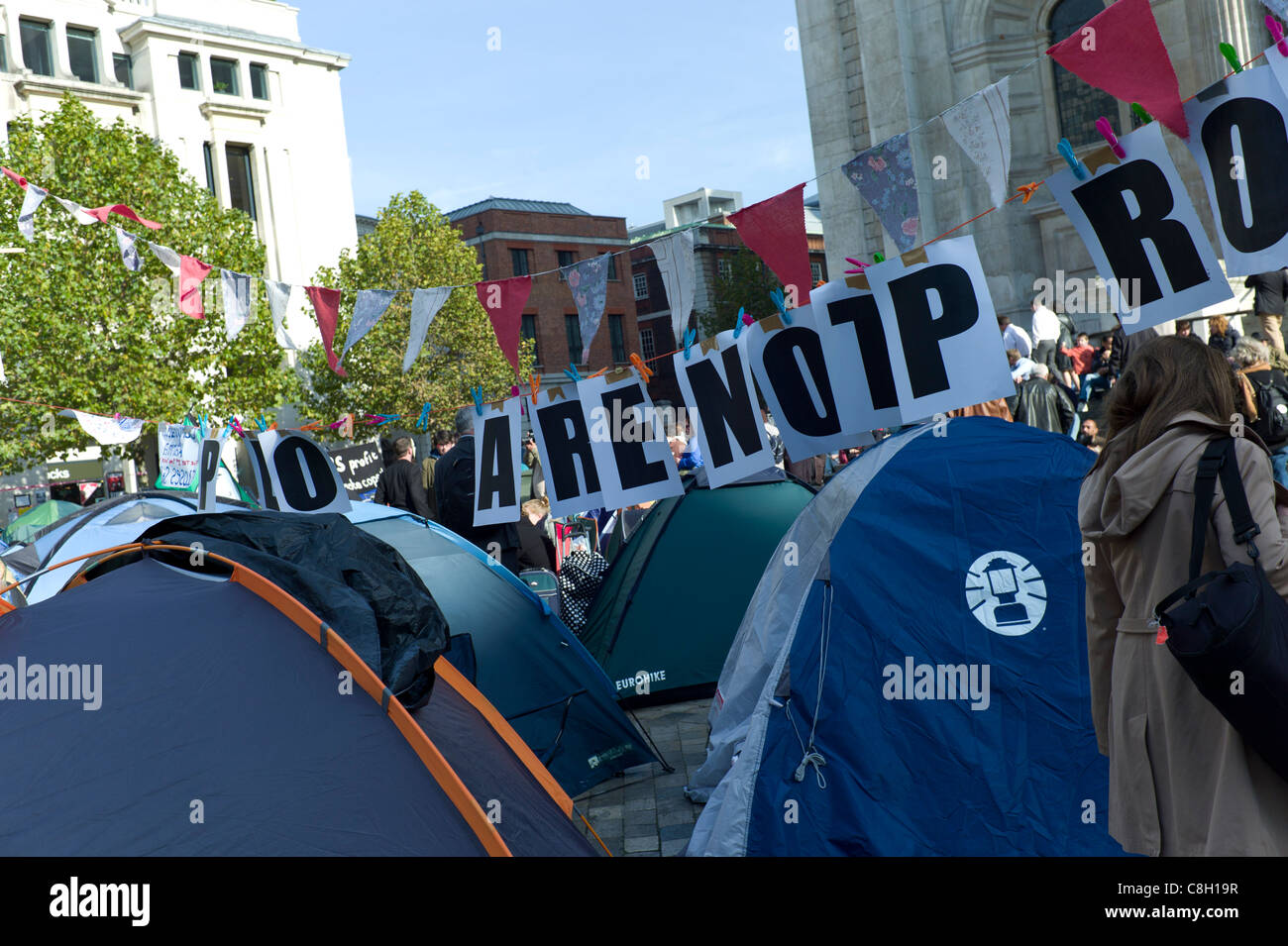 Tents with slogans, posters and banners at the anti Capitalist protest ...